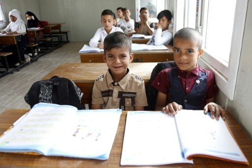En Irak, des enfants roms retournent à l'école pour la première fois en ...
